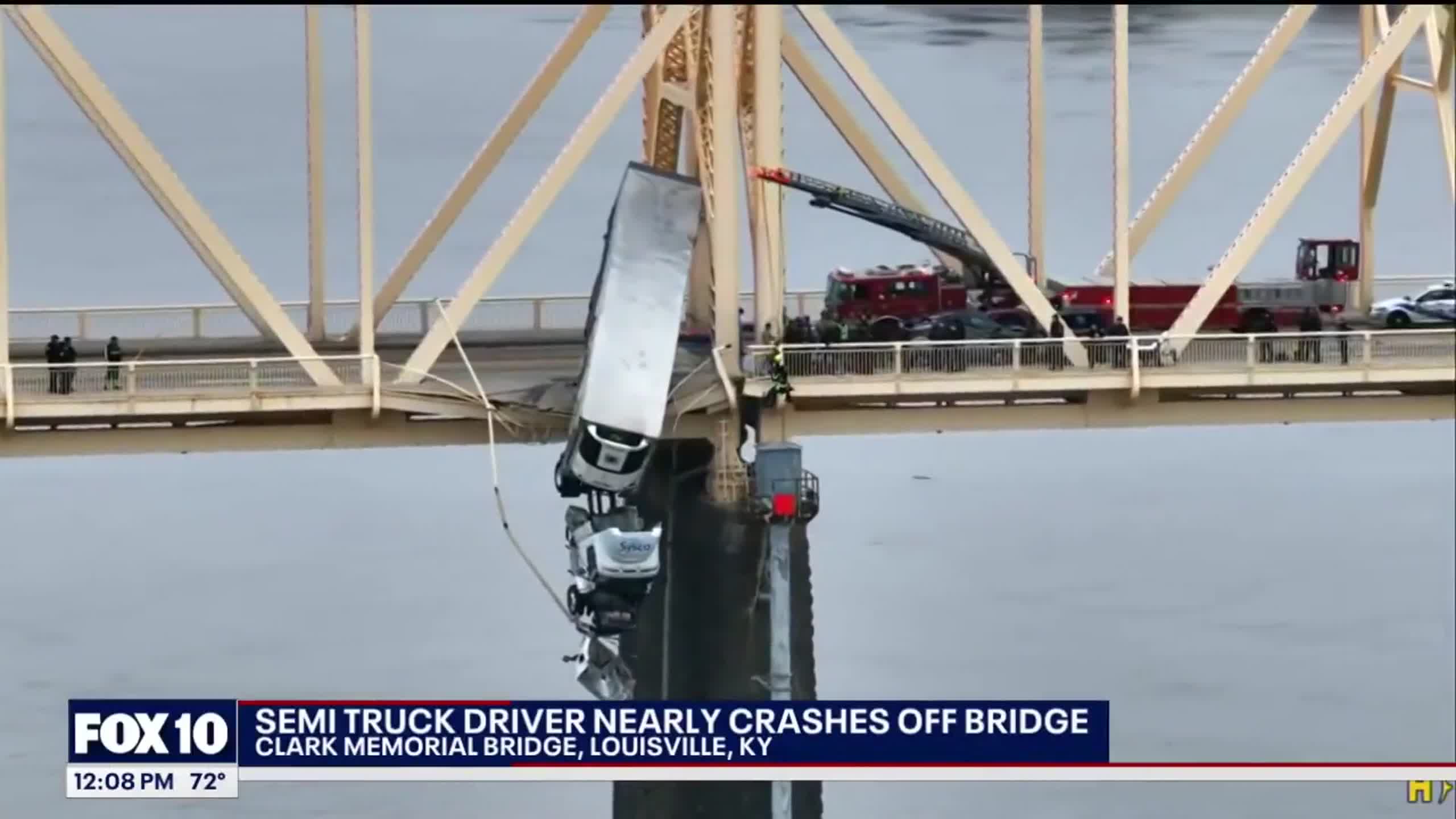 Semi-truck dangles off Louisville bridge | Lexington Herald Leader