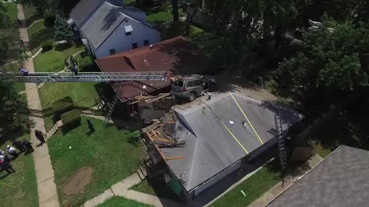 Car goes airborne, lands on house's roof | Raleigh News & Observer