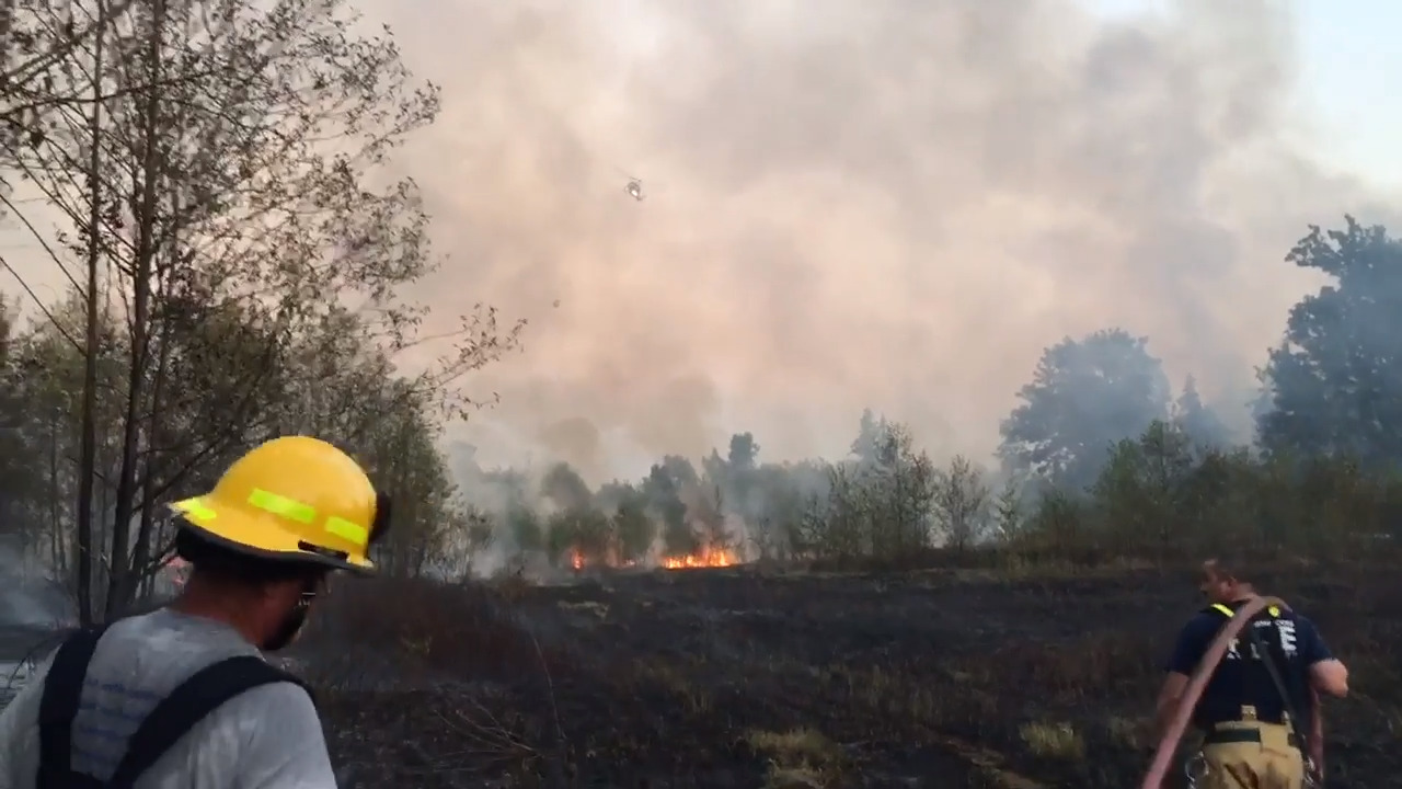 DNR helicopter helps fight fire with water drops | The State