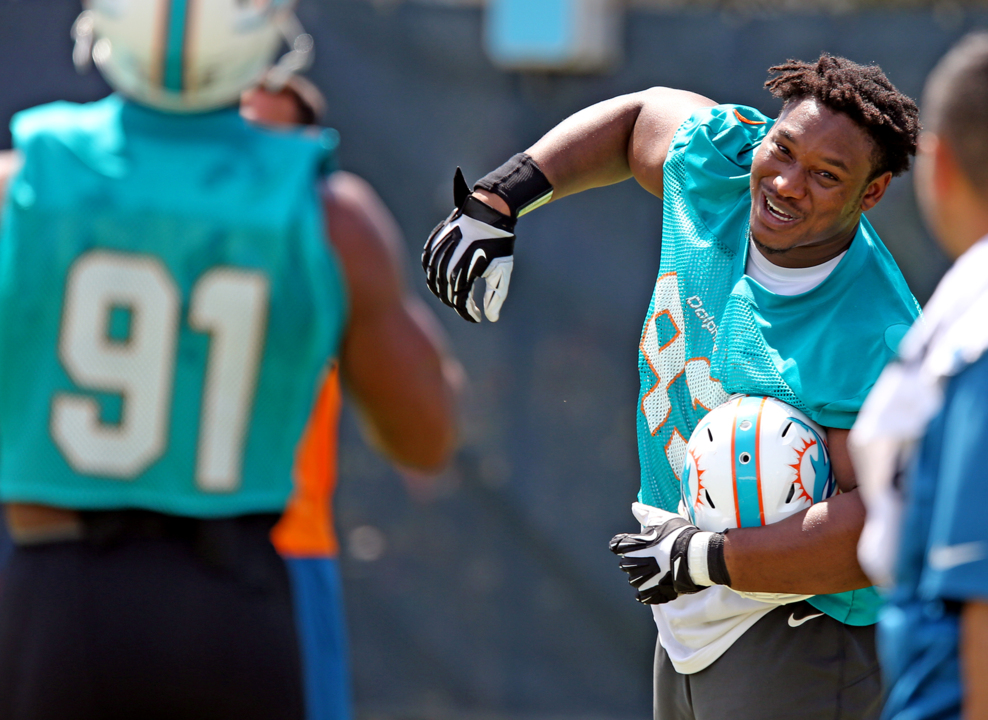 Miami Dolphins defensive tackle Akeem Spence speaks to the media ...