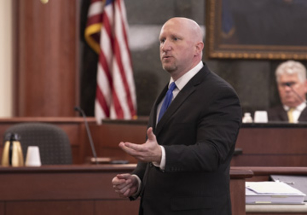 Defense attorney Rob Madsen delivers an opening statement in the death ...