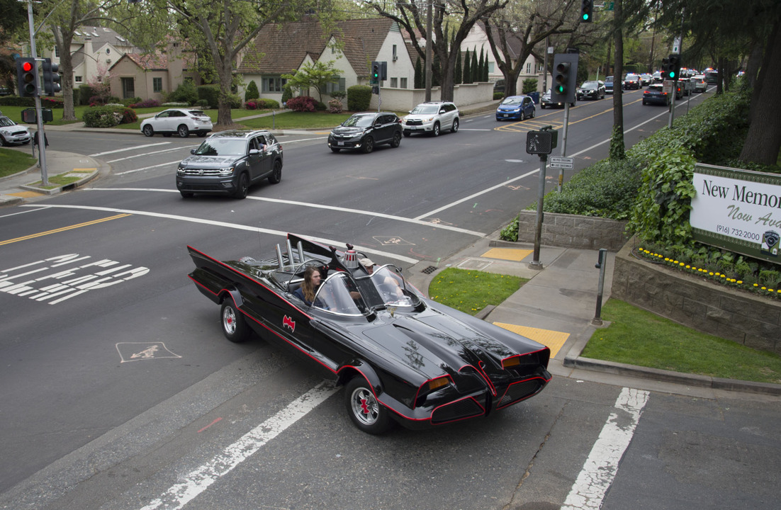Jacob Wingert, 14, holds is brother's ashes in an urn as he rides in a ...
