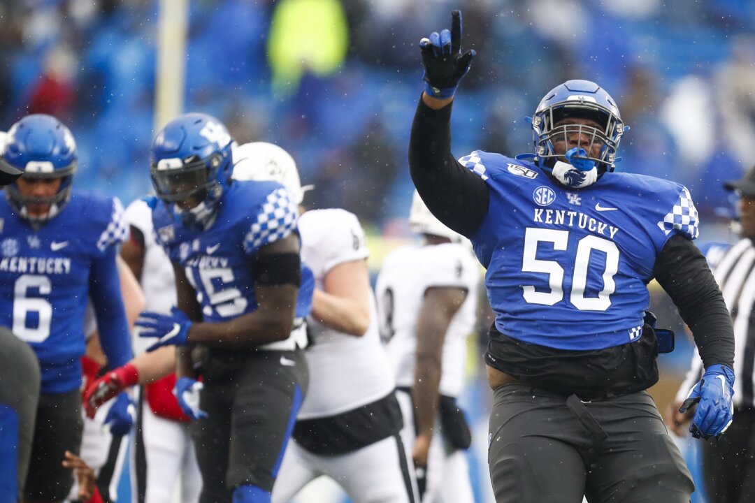 Kentucky football's Marquan McCall representing mower company ...
