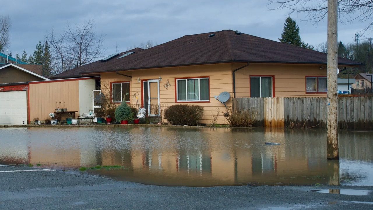 Woman swept away by flood found dead, highways reopen | Tri-City Herald