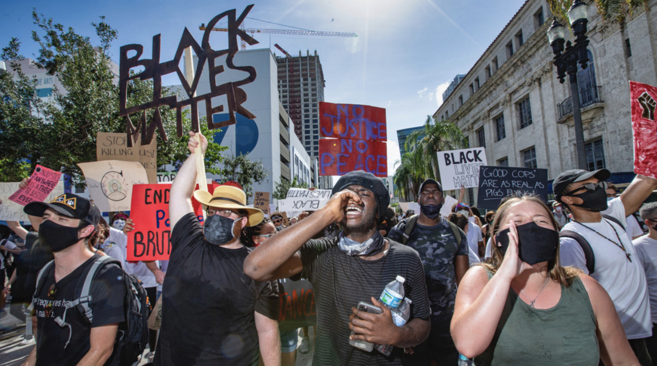As protesters demonstrated Saturday evening, Miami-Dade Mayor Carlos ...