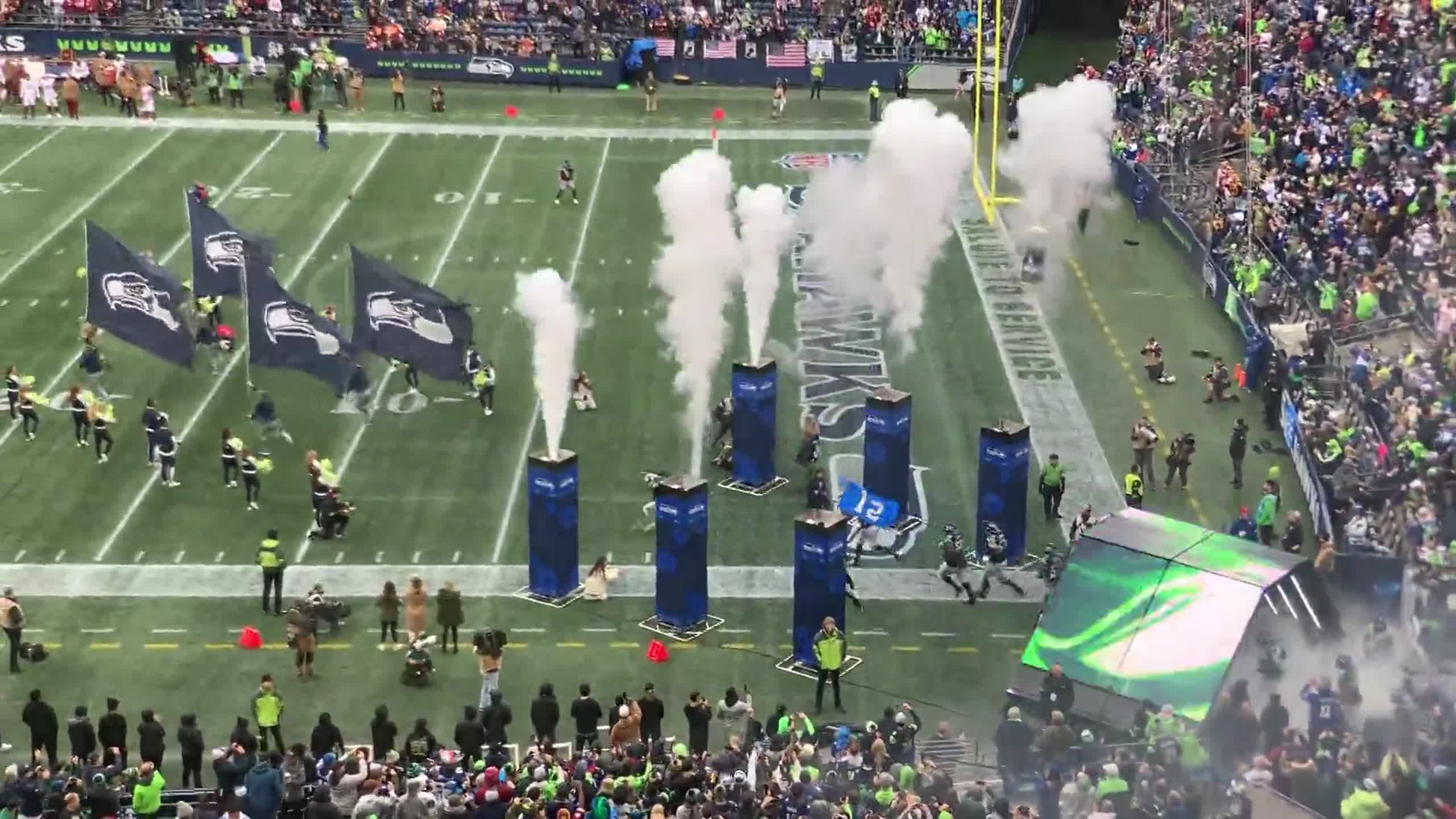 West Point graduate Jon Rhattigan carries 12 flag leading Seahawks out ...