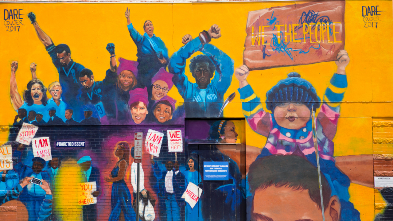 Artist restores defaced mural in Raleigh | Kansas City Star