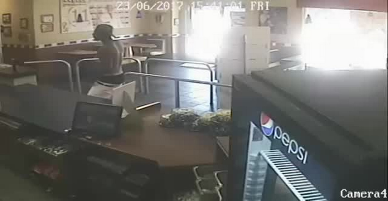 Watch man take a swing at employee, hop counter at fast food restaurant ...