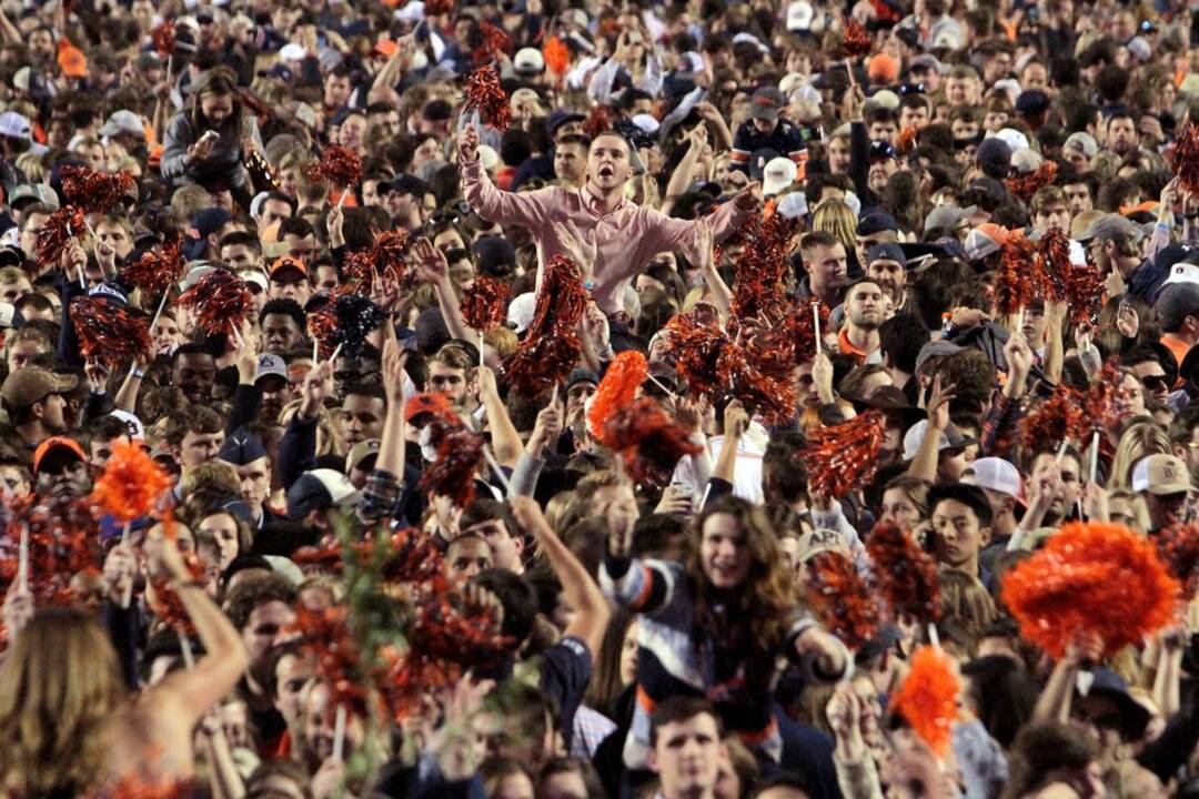 Auburn fans storm the field after win over Alabama | Columbus Ledger ...