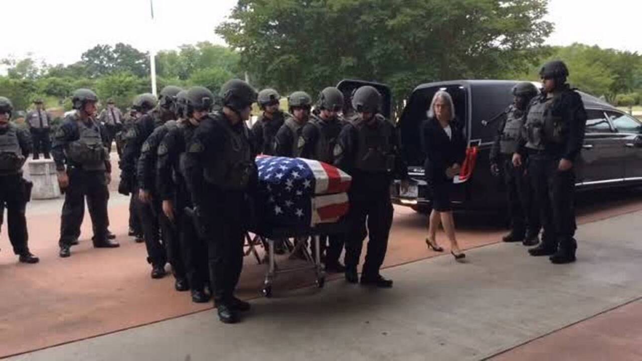 Body of Bibb Investigator TJ Freeman escorted to funeral | Macon Telegraph