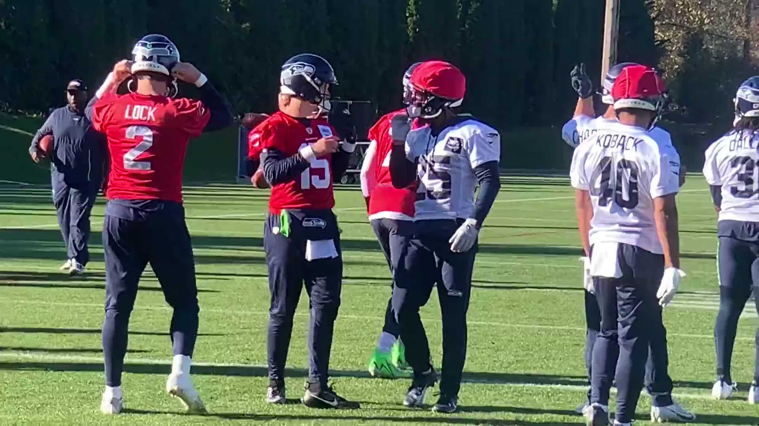 New 3rd QB Brett Rypien talks to Kenny McIntosh at Seahawks practice 2 ...