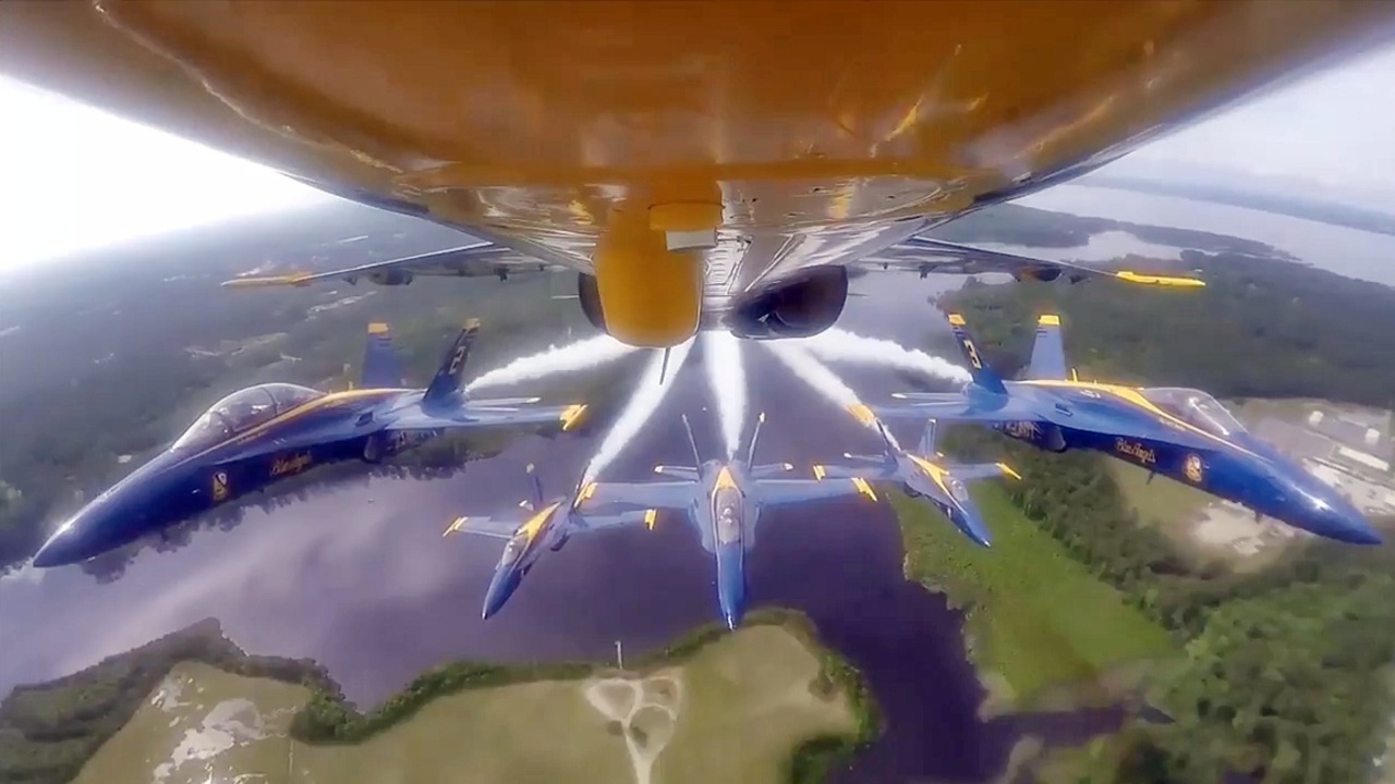 Watch how close the Blue Angels fly to each other duing an air show ...