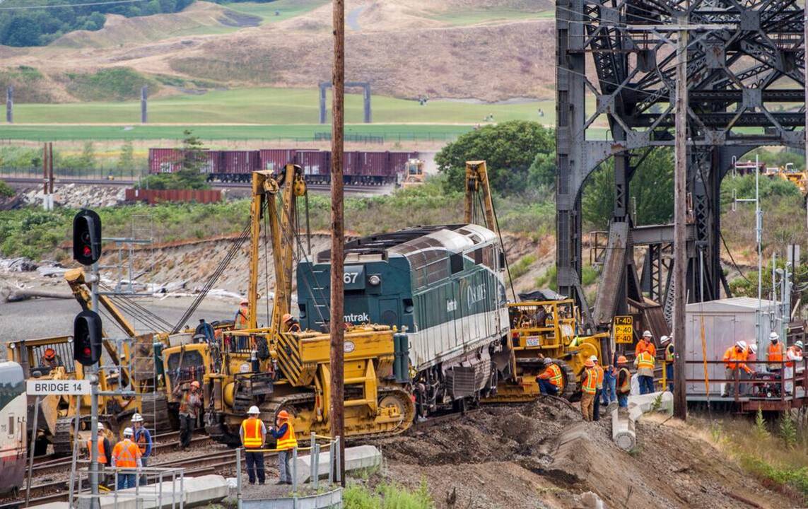Crews remove derailed Amtrak train from Chambers Bay causeway | Raleigh ...
