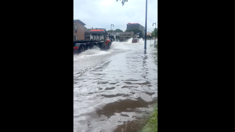 Heavy rains flood busy street near downtown Wichita, Kansas | Wichita Eagle
