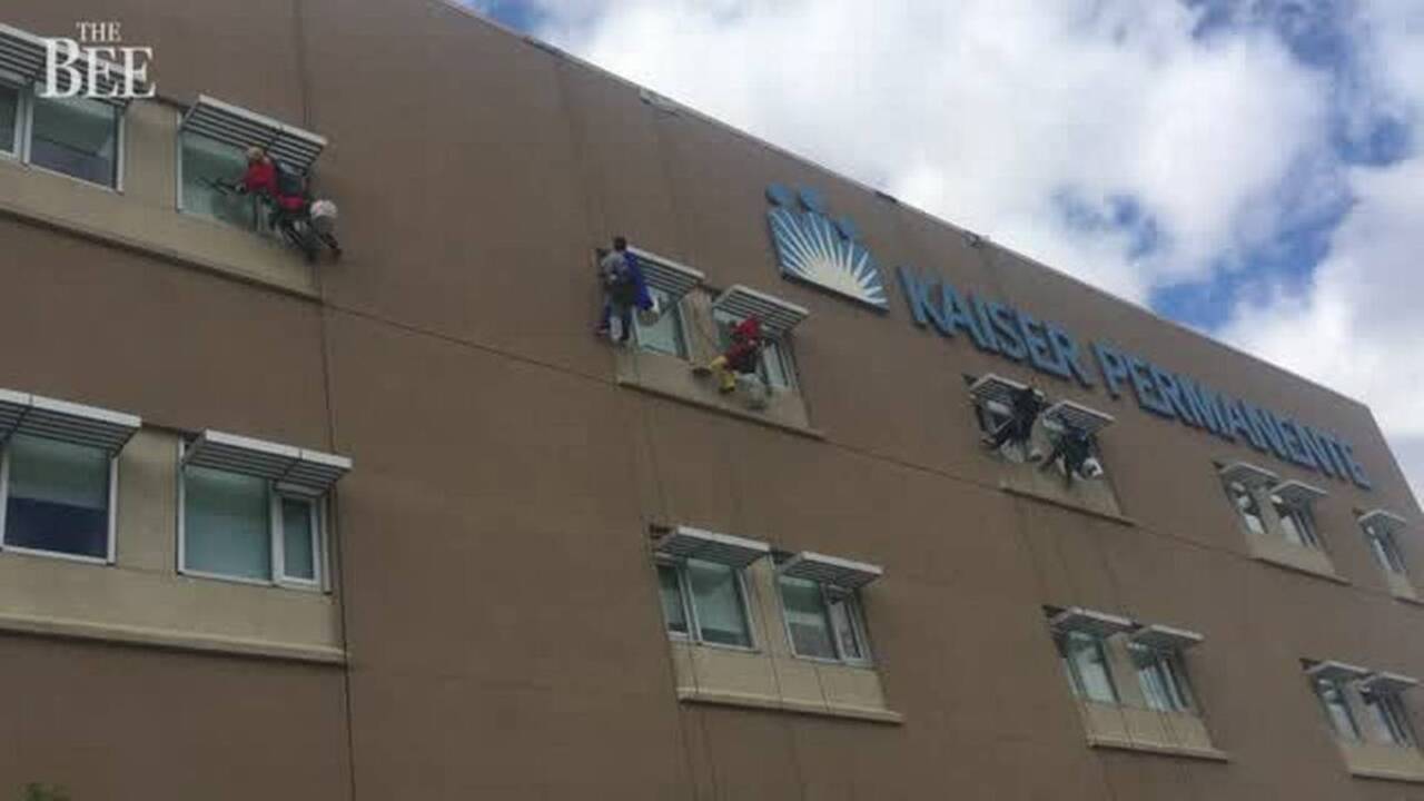 Watch superheroes clean the windows at Kaiser Roseville's children's ...