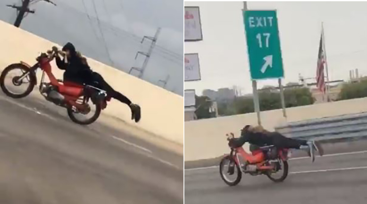 Daredevil motorcyclist performs stunt on San Antonio highway ...