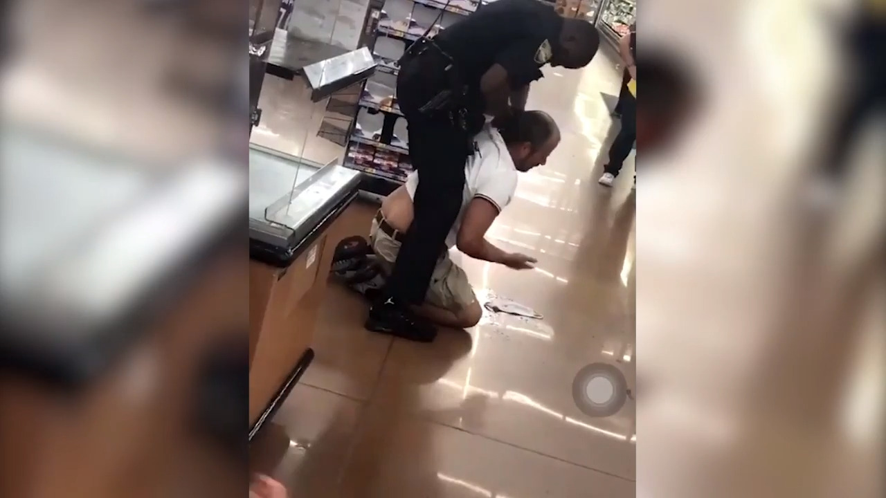 Watch a video of cop and customer fighting at Florida Walmart | Miami ...