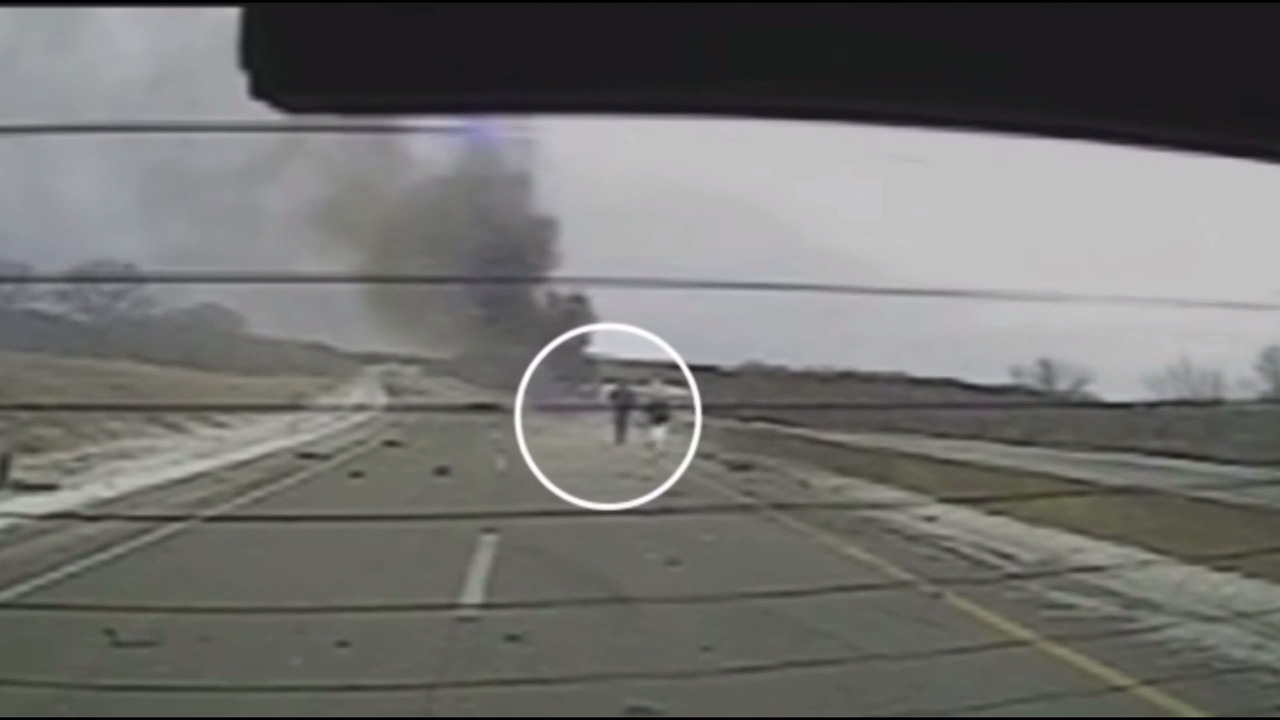 Kansas Highway Patrol Trooper rescue a man from a burning semi truck ...