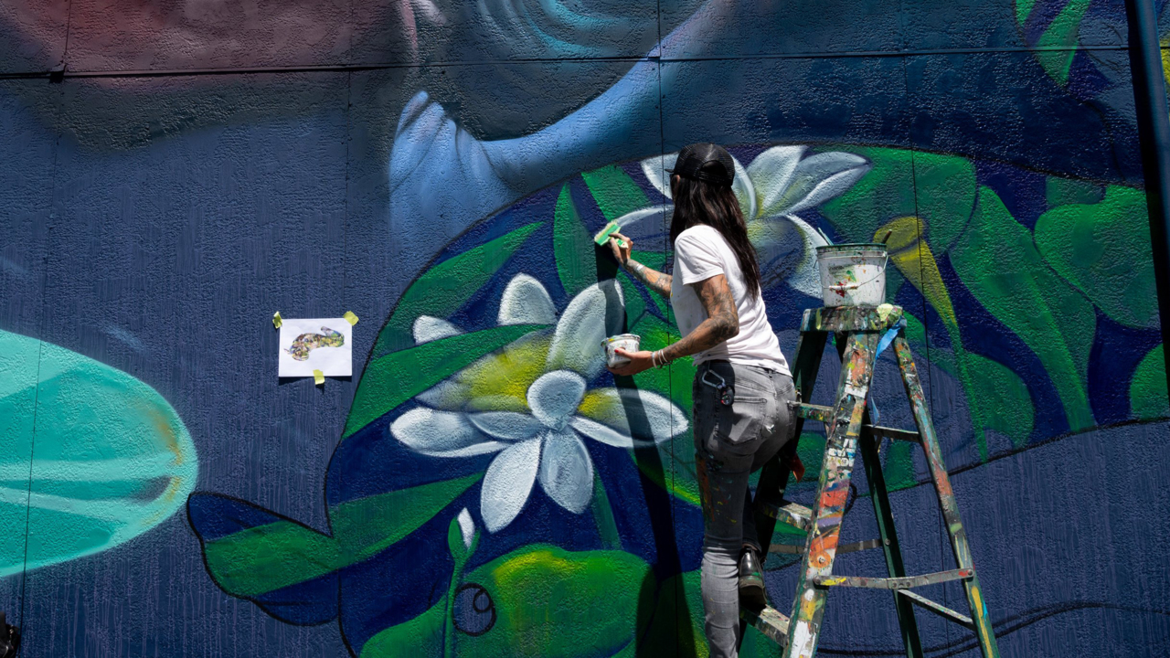 See Wide Open Walls artists create mural with river theme | Sacramento Bee