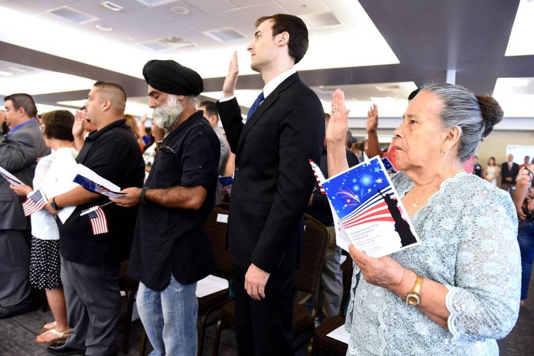 Watch as new American citizens take the Oath of Allegiance in Modesto ...