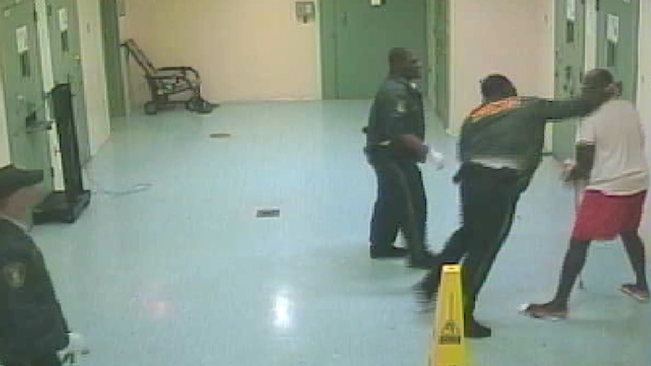 Video shows guard pummeling handcuffed Miami-Dade inmate | Miami Herald