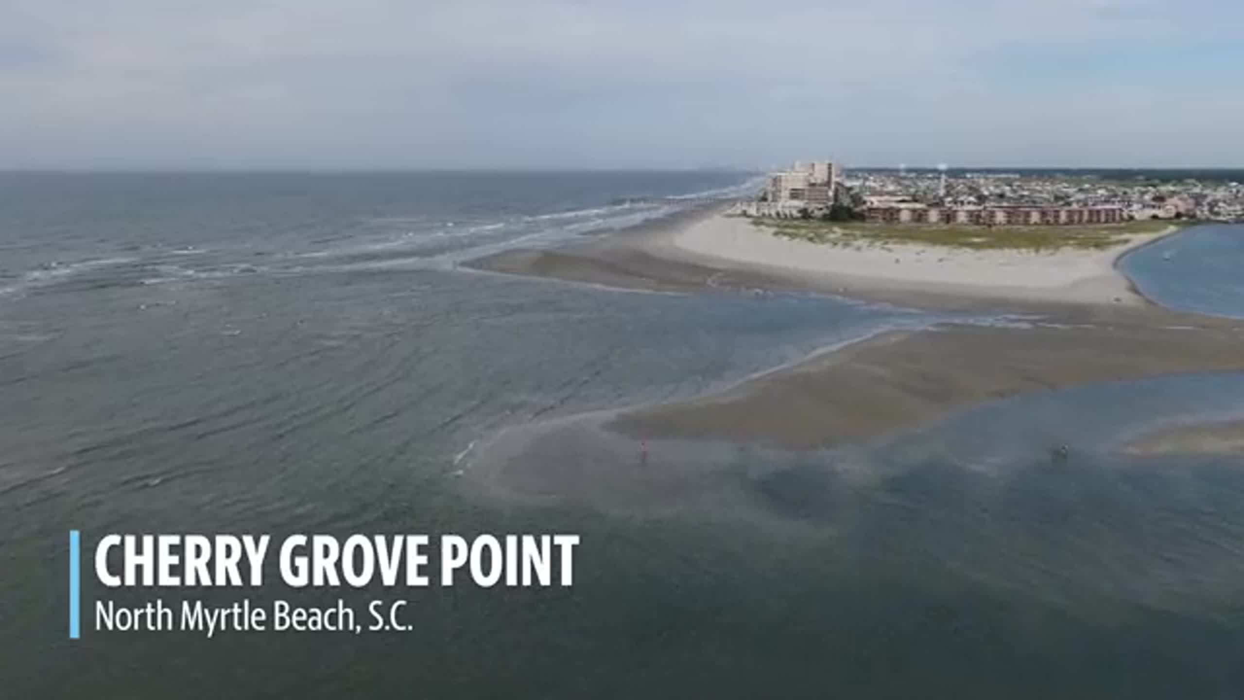 Aerial view of the sandbars and tidal pools at Cherry Grove Point in ...