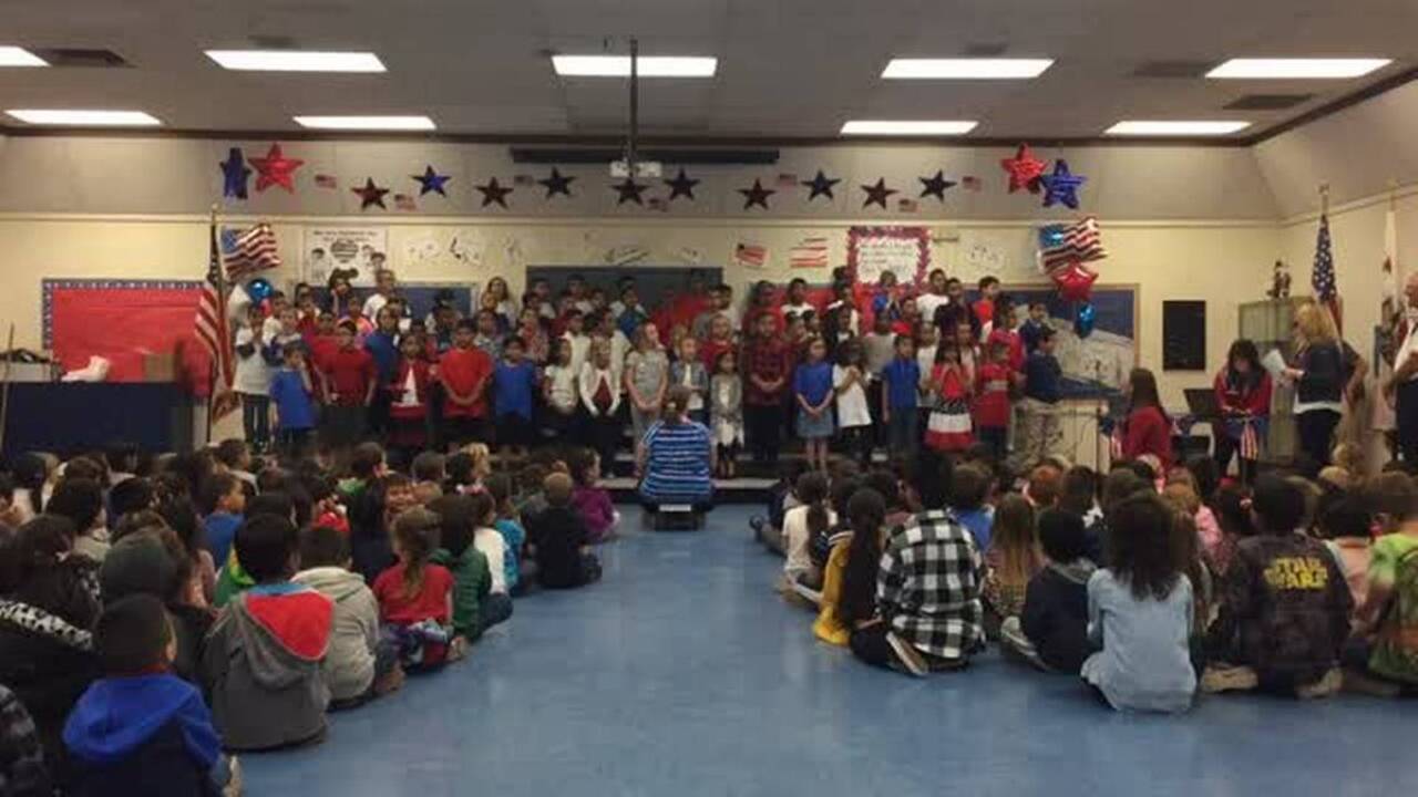 School's Veterans Day salute bribgs home what allegiance means ...