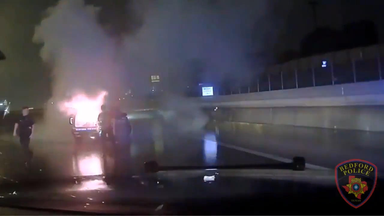 Video shows Bedford, TX police officer saved from car on fire | Fort ...